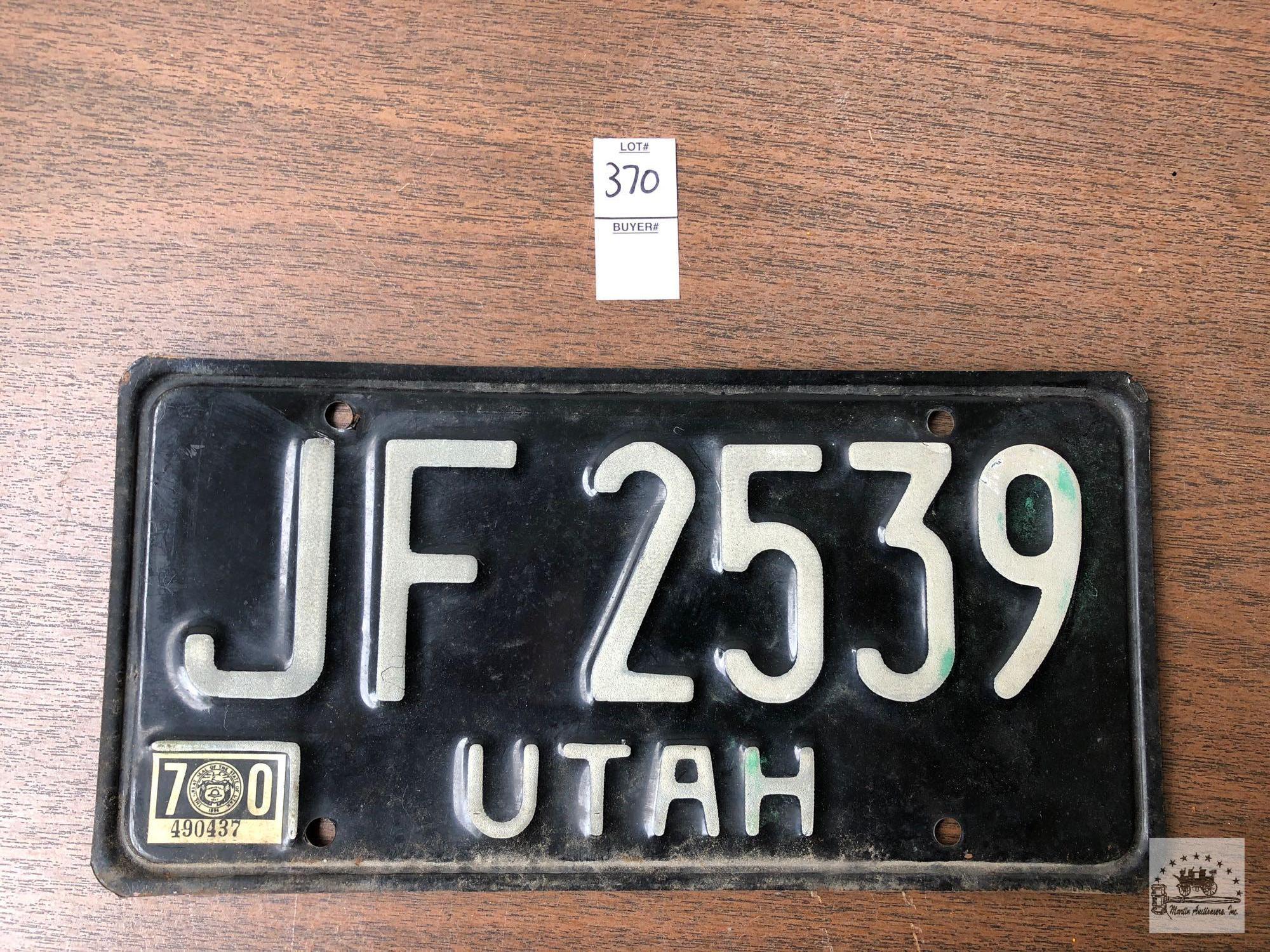 Utah 70's era white on black license plate | Proxibid