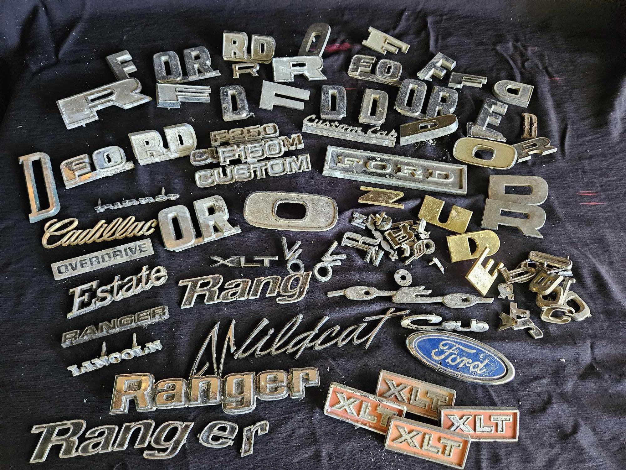 Large grouping VINTAGE CAR EMBLEMS Including Road | Proxibid