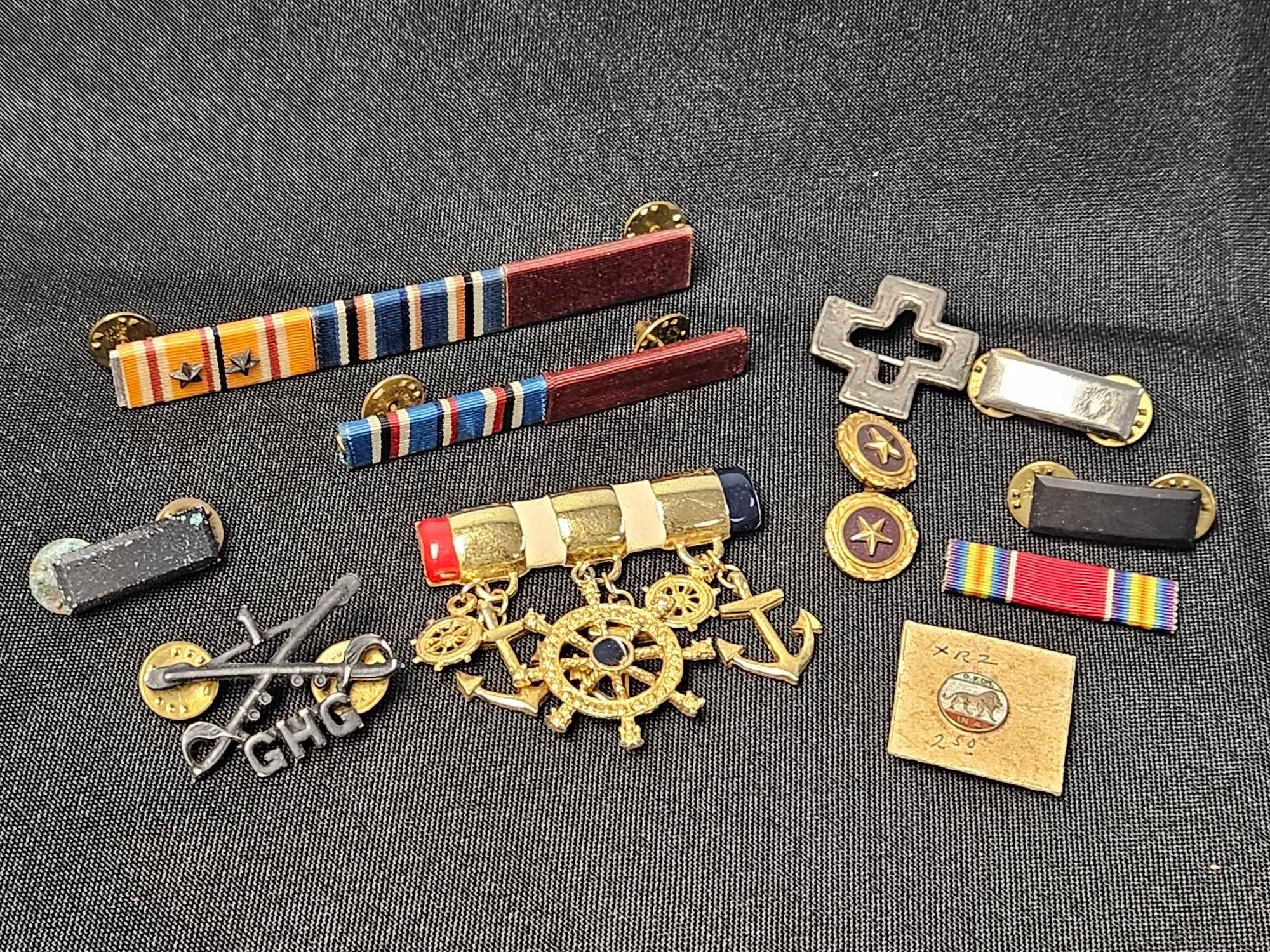 Grouping of military bars, pins including naval. | Proxibid