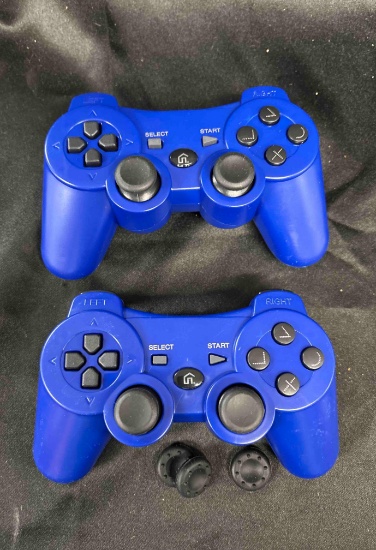 two blue DualShock 3 wireless controllers for the PlayStation 3 (PS3) | Online Auctions | Proxibid