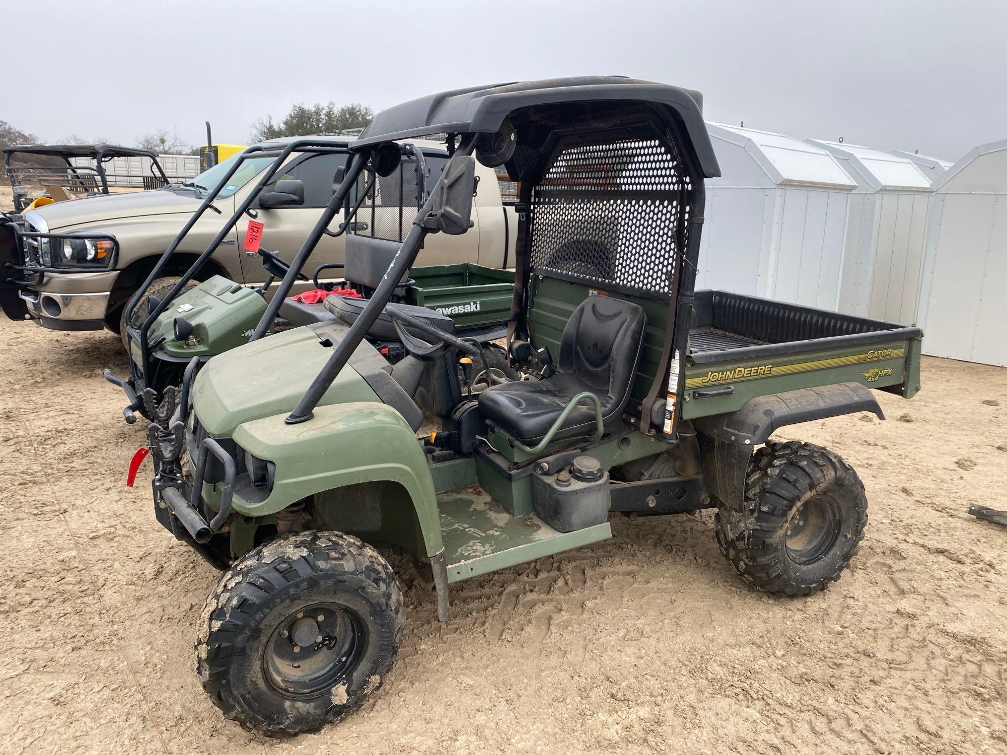 John Deere Gator 4X4 with Poly Top, Gun Rack and | Proxibid