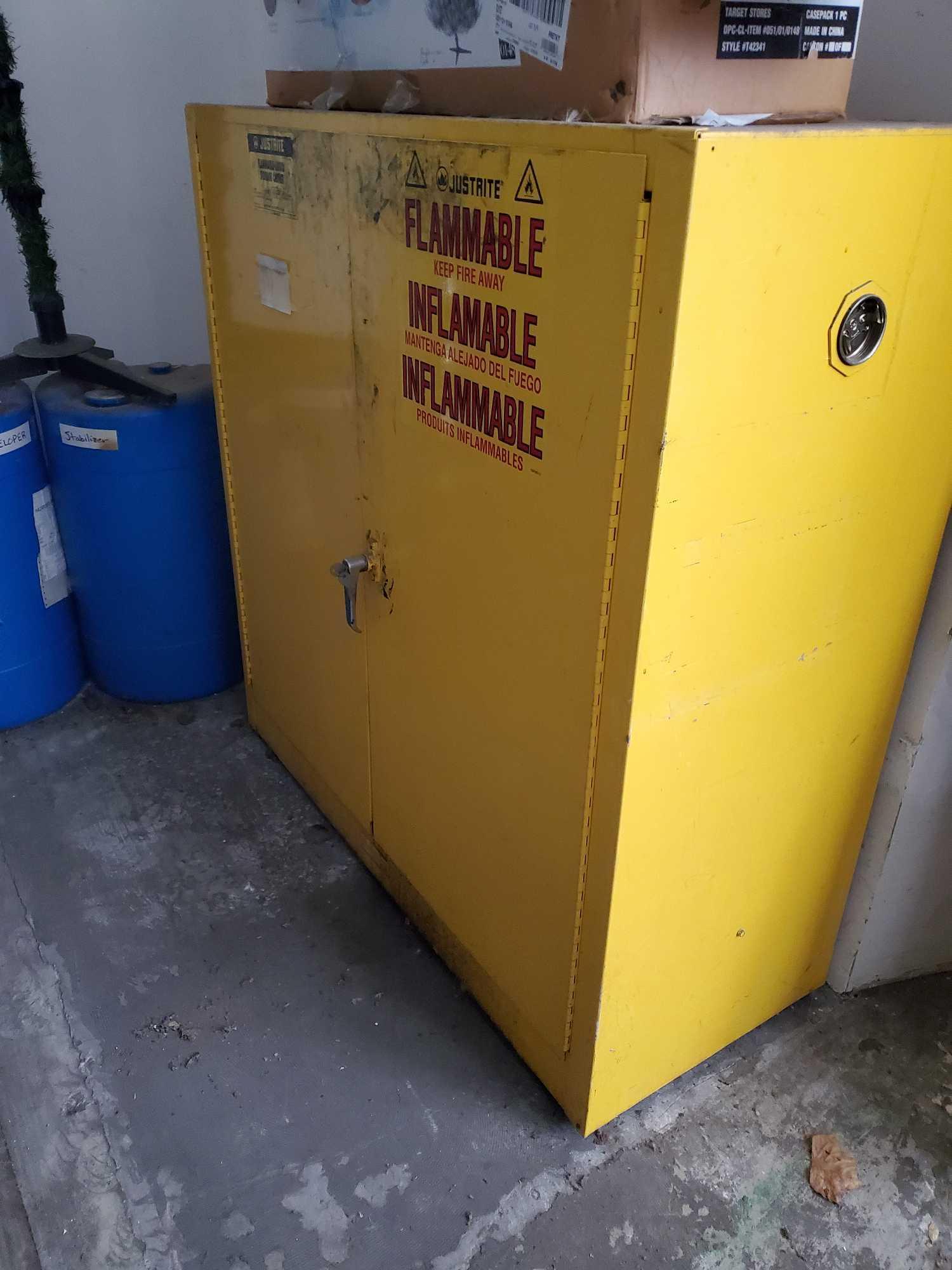 JUSTRITE FLAMMABLE LIQUID CABINET WITH CONTENTS | Proxibid