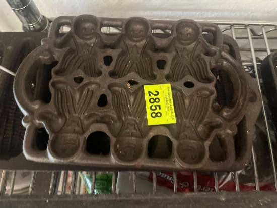 cast iron gingerbread man mold | Online Auctions | Proxibid