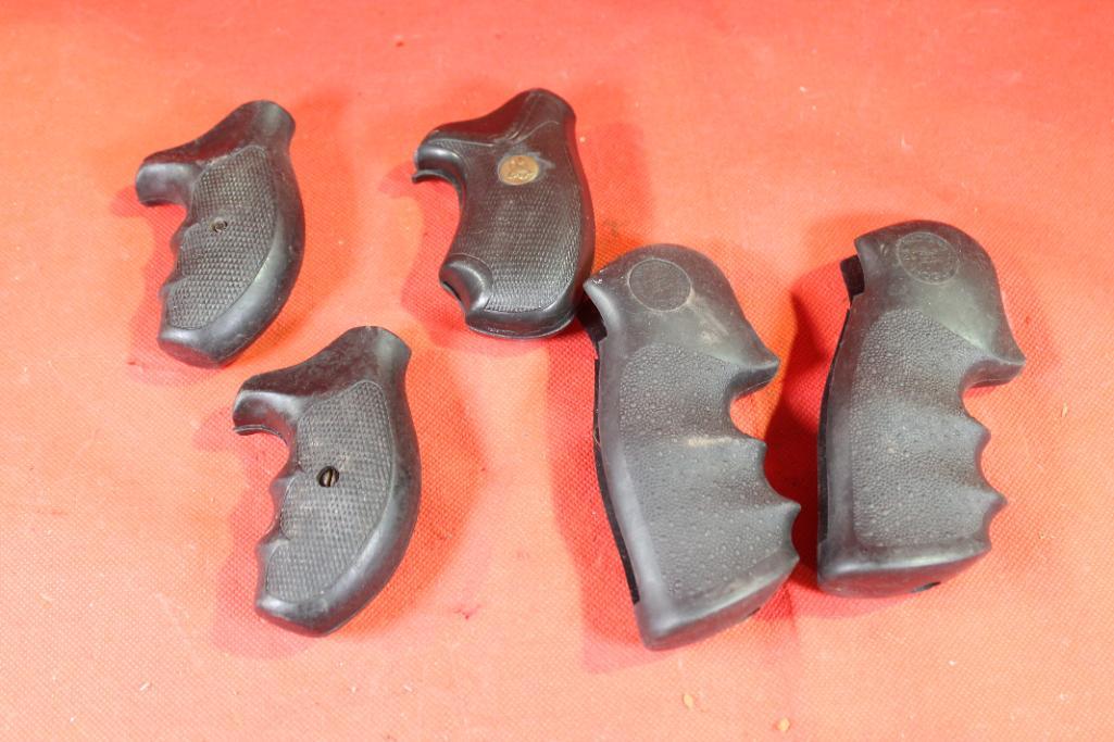 Five hard rubber and plastic pistol grips. One | Proxibid