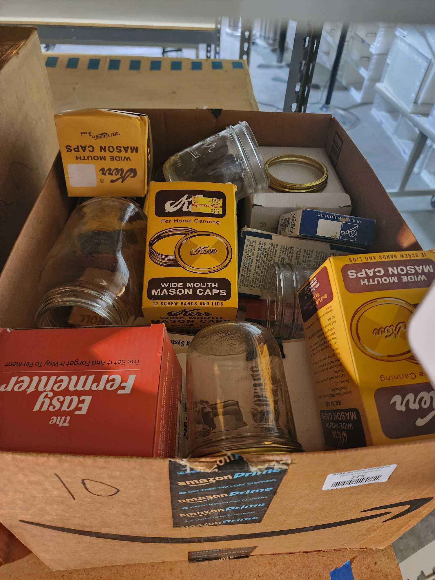 Large box of KERR canning jars and caps. | Proxibid