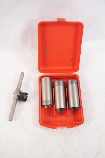 One Beretta 12 ga choke tool and one red choke tube box with three ...