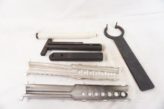 Two heat shields, one spanner wrench, one AR upper receiver vice block ...