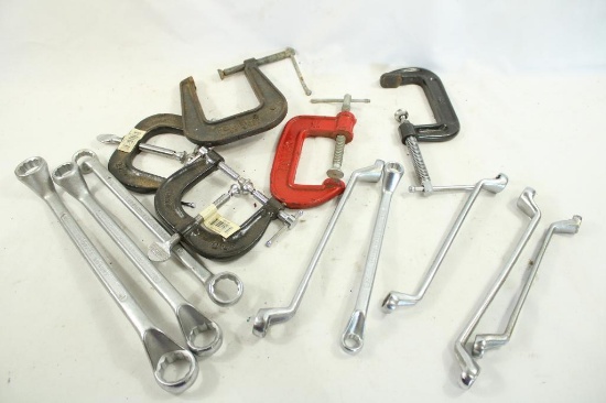 Two edge clamps, three C-clamps, and eight offset box end wrenches ...