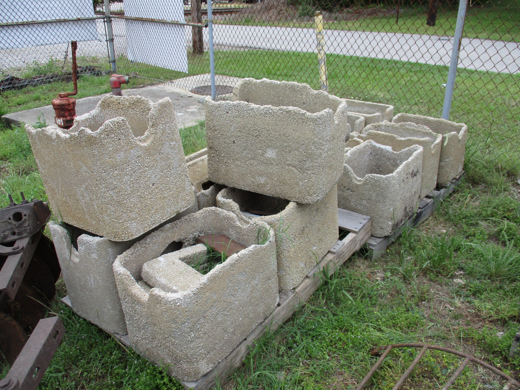 (4) pallets concrete water meter boxes | Proxibid