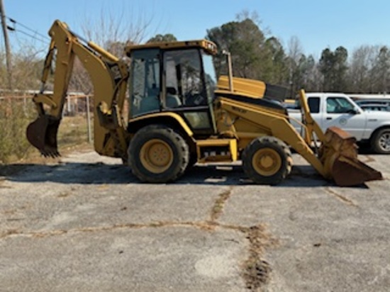 Cat rubber tire backhoe | Online Auctions | Proxibid
