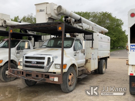 Altec LRV55, Over-Center Bucket Truck mounted behind cab on 2010 Ford F750 Chipper Dump Truck ...