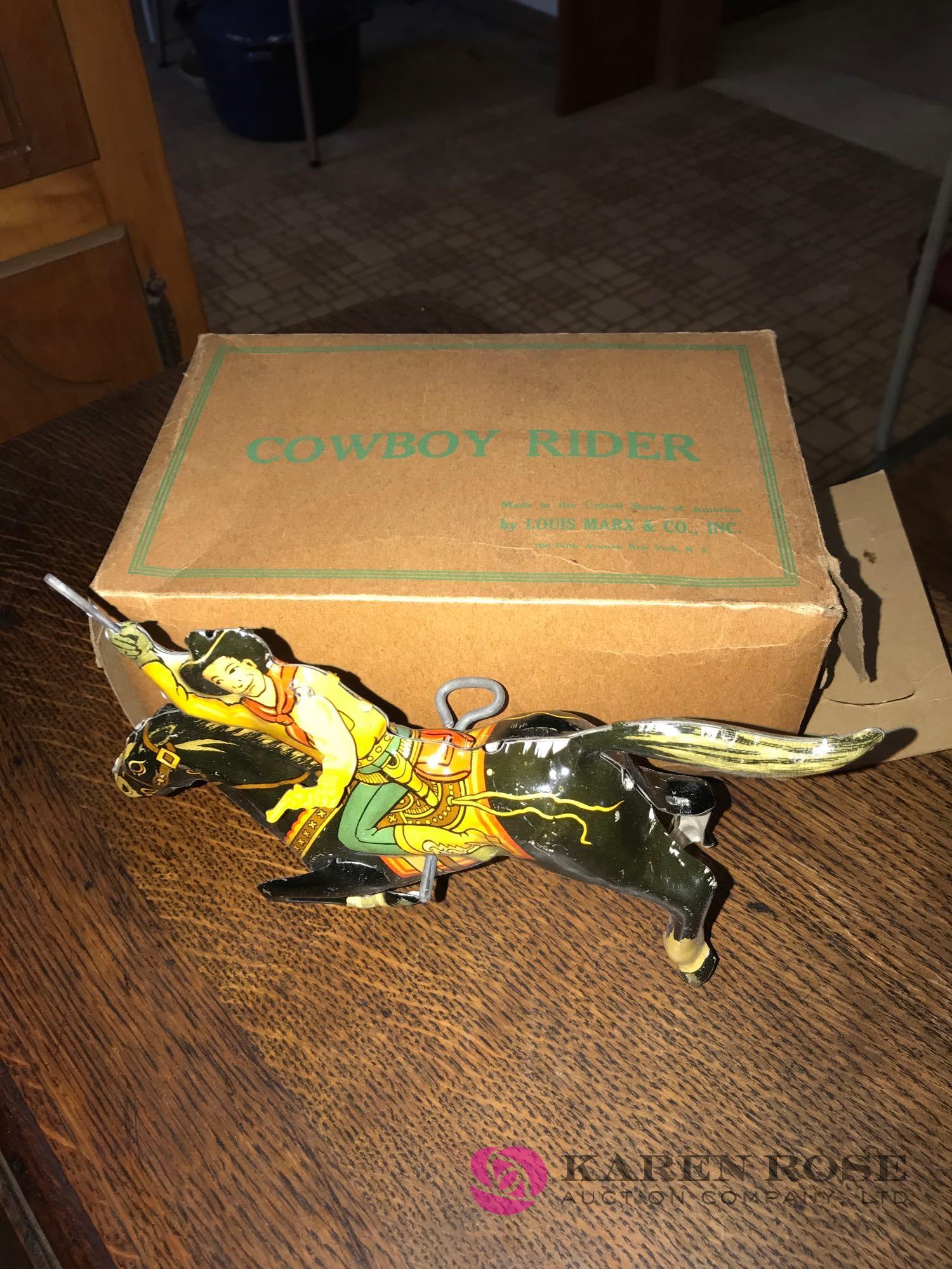Vintage Louis Marx cowboy rider tin wind up with | Proxibid