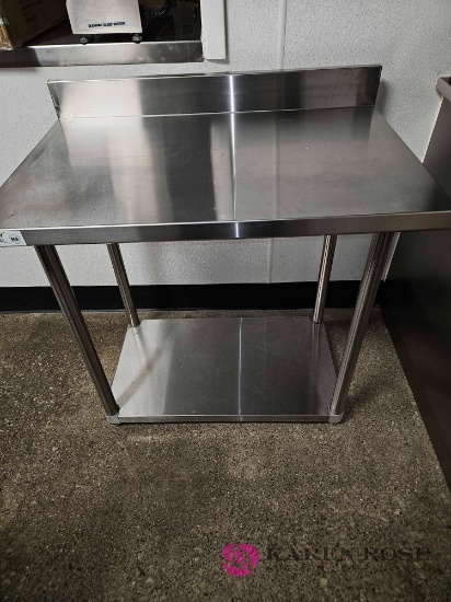 Thirty six by twenty four stainless table | Online Auctions | Proxibid