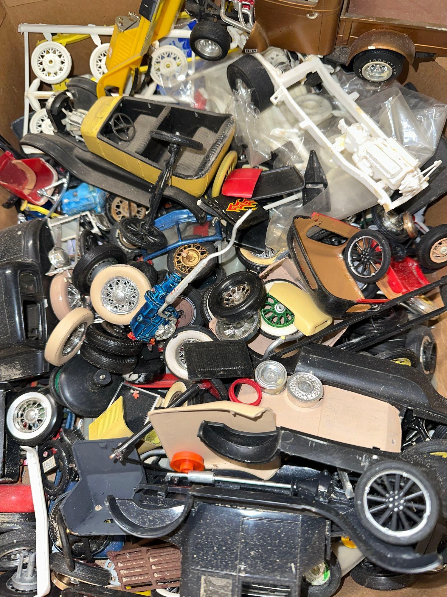 large box of model A and T parts for kits | Proxibid