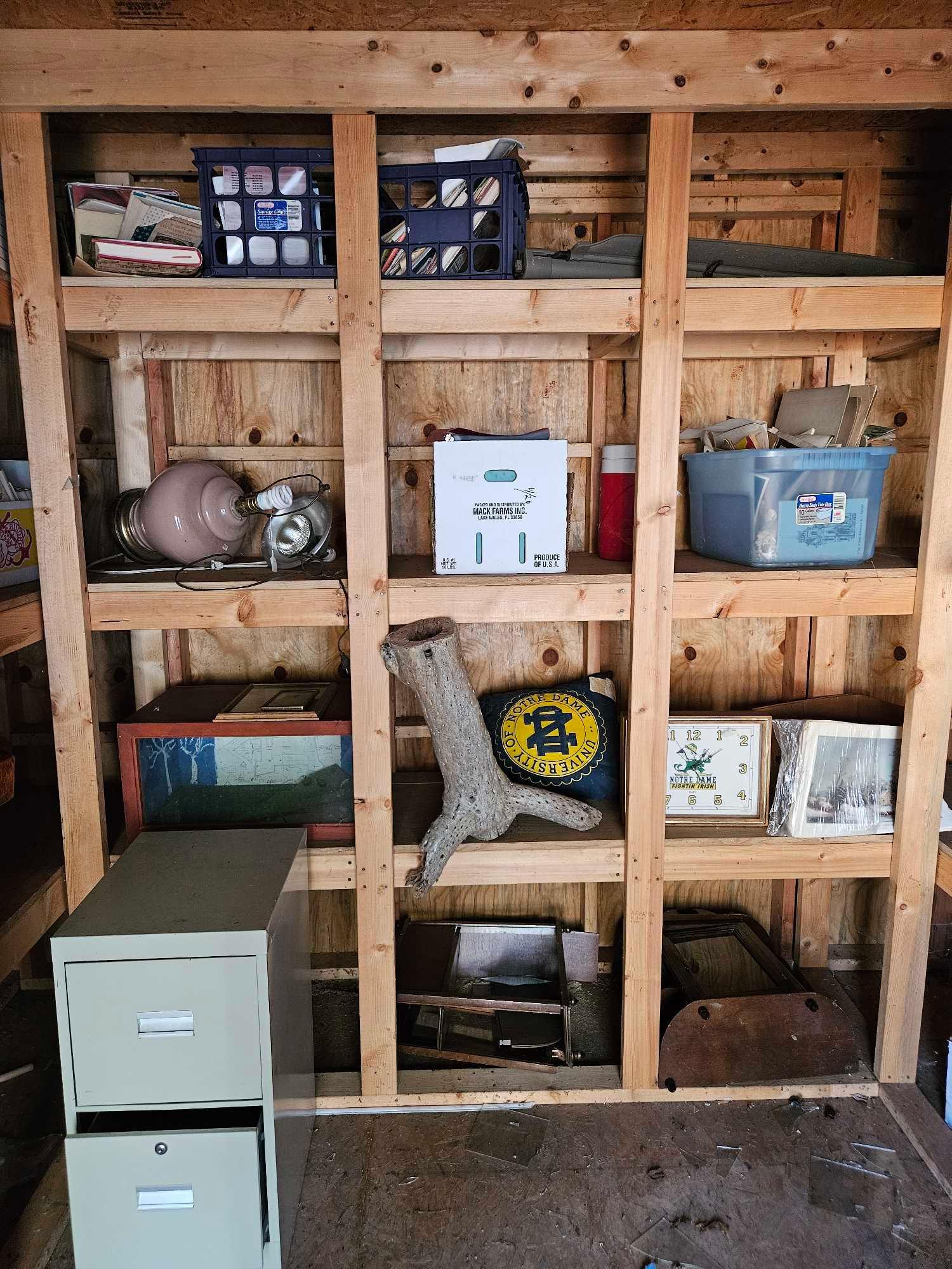 Content of back wall shelves. | Proxibid