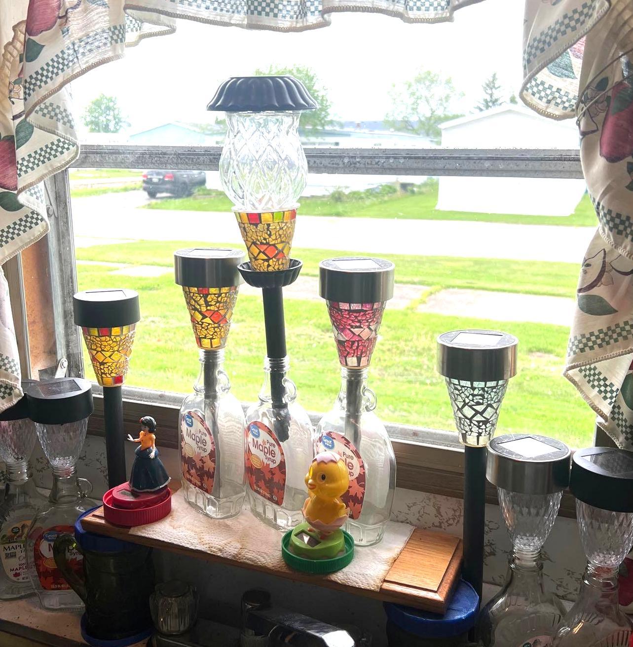 color solar lights and clock in kitchen | Proxibid