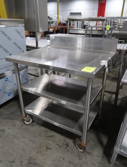 stainless table w/ backsplash & 2) undershelves, on casters ...