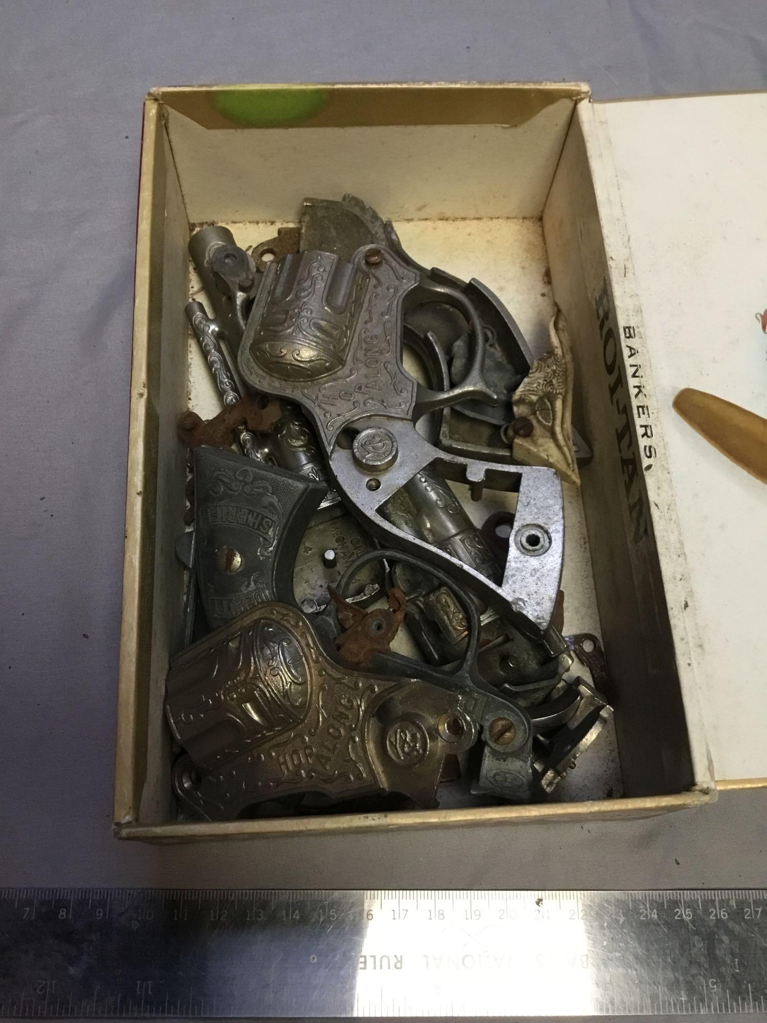 cigar box, full of cap, gun parts | Proxibid