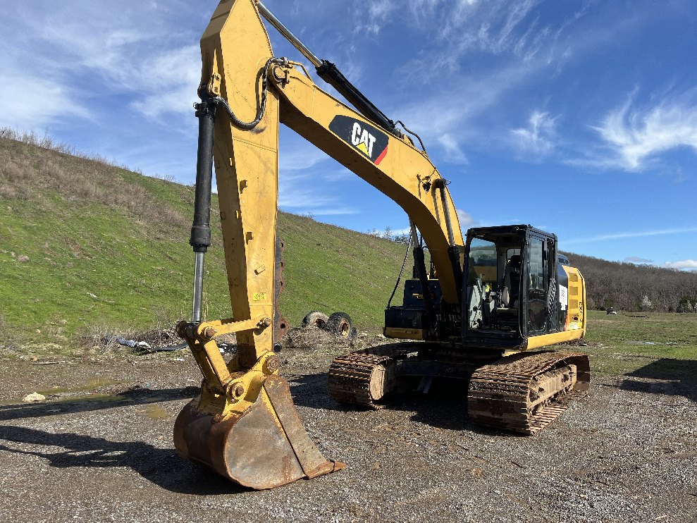 CAT 320E - L Excavator | Proxibid