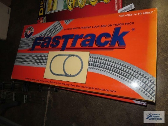 Two Lionel Fast Track inner passing loop track packs, number 6-12028 ...