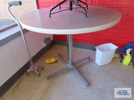 Formica top table with metal base,3 ft wide by 30 in tall. Roll about ...