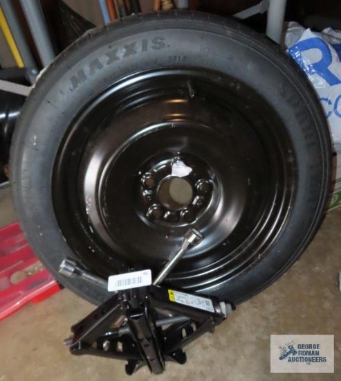 Scissor jack, speed wrench, and spare tire for 2020 Ford Fusion. Never ...