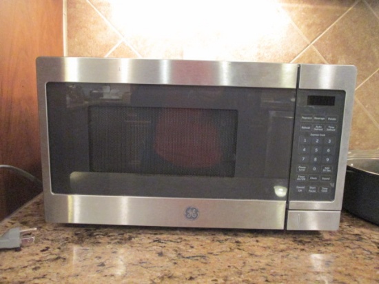 GE Stainless 700watt Turntable Microwave Oven | Online Auctions | Proxibid