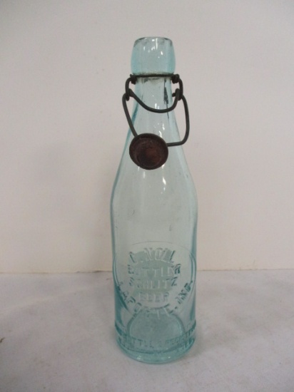 C Noll Bottler Schlitz Beer with Resealable Flip Top. | Online Auctions ...