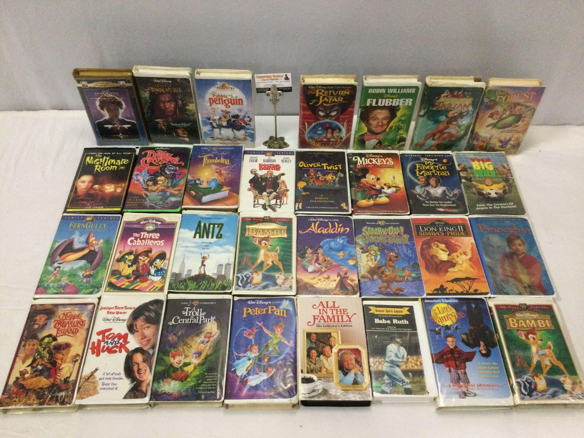 Lot of vintage clamshell VHS movies; Disney, | Proxibid