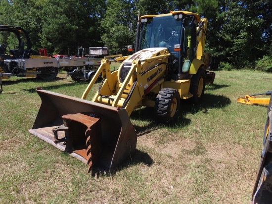 KOMATSU WB 146 backhoe, 4x4, closed A/C cab, 90inch JRB loader bucket ...