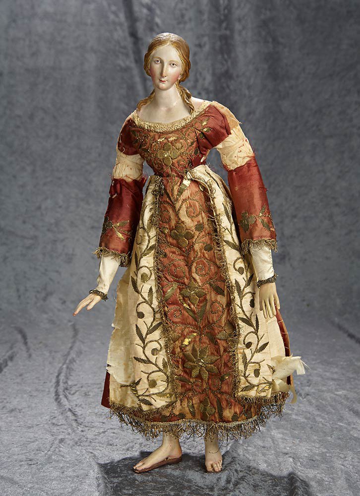 22" Neopolitan figure of woman with brown | Proxibid