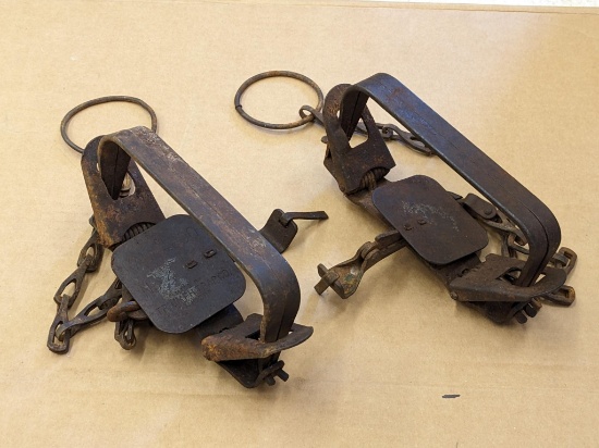 Two No. 4 Kangaroo animal traps made by the Triumph Trap Co. Both with ...