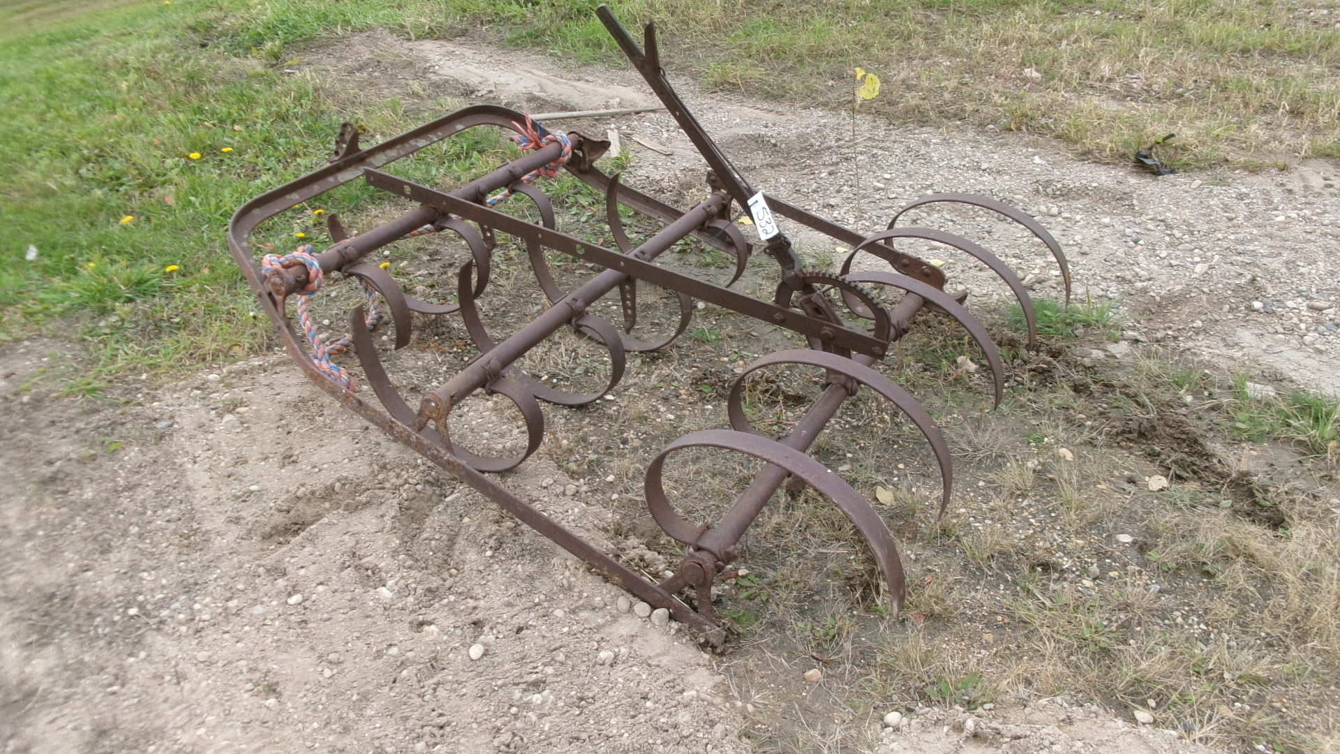 5' SPRING TOOTH CULTIVATOR, mechanical lift | Proxibid