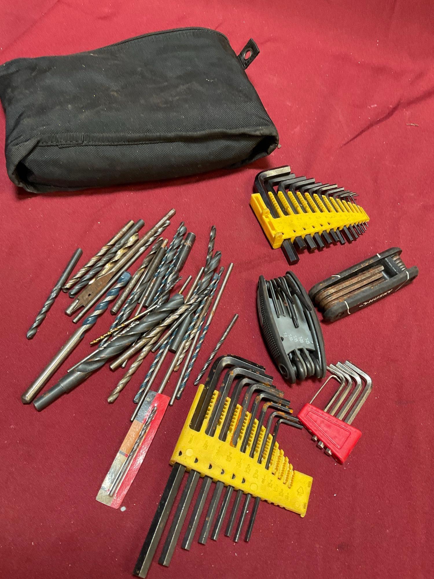 Bag and assorted drill bits and L & star keys. 30 | Proxibid
