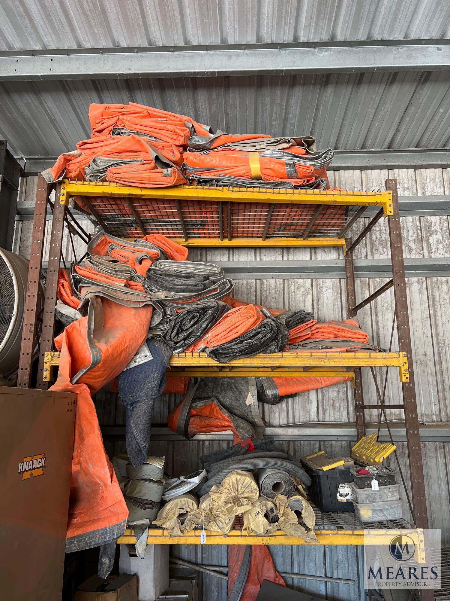 Two Shelves of Tarps and Protective Coverings | Proxibid