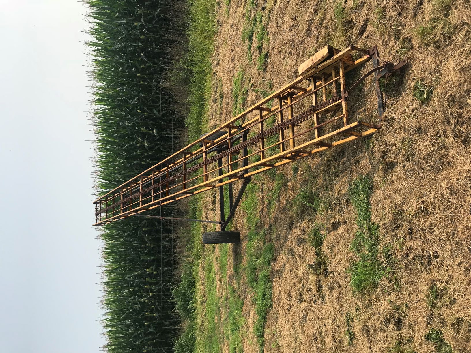 Snowco 30’ skeleton bale elevator on dolly | Proxibid