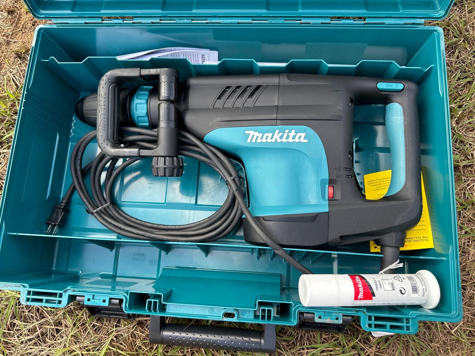 MAKITA 20 LB DEMOLITION HAMMER- HM1203C- 1 YR | Proxibid