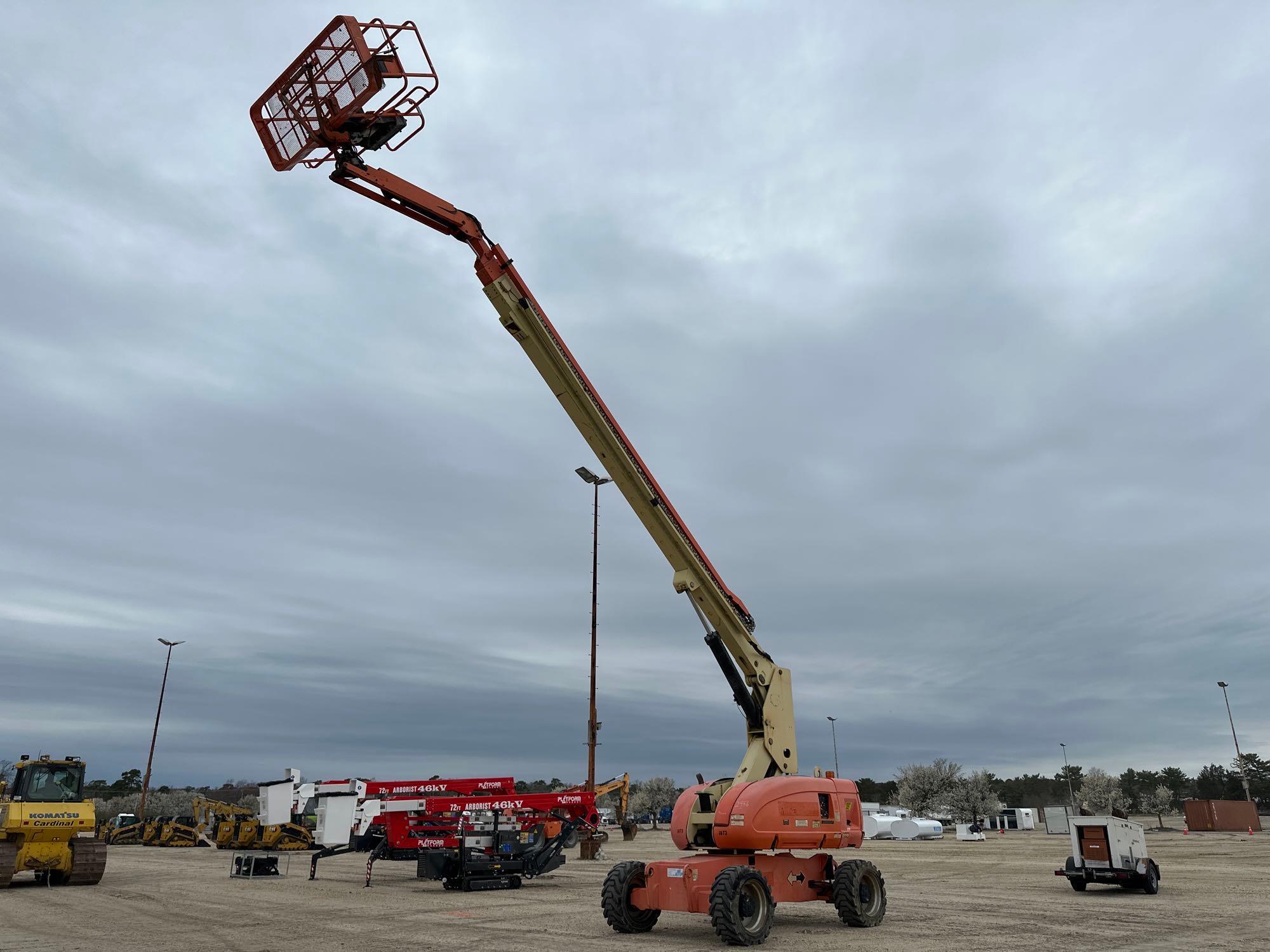 JLG 860SJ BOOM LIFT SN:3000101073 4x4, powered by | Proxibid