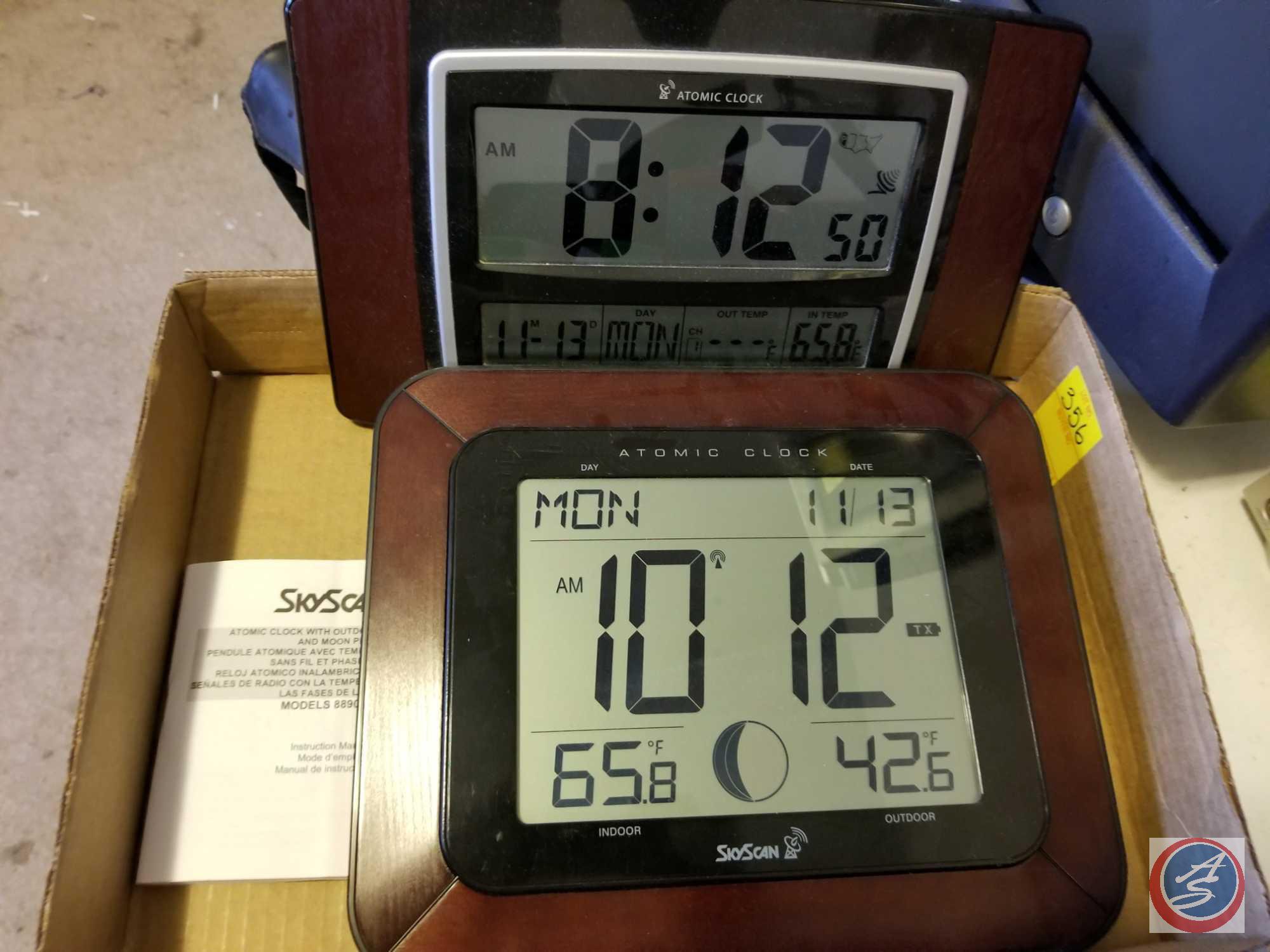Sky Scan atomic clock and a Sharp digital clock | Proxibid