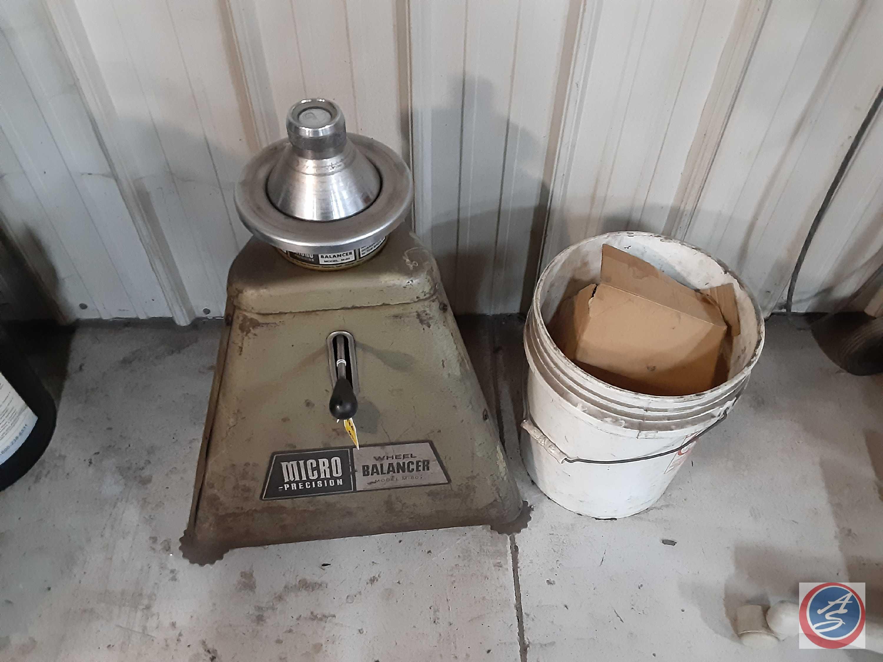 Micro precision wheel balancer with weights. | Proxibid