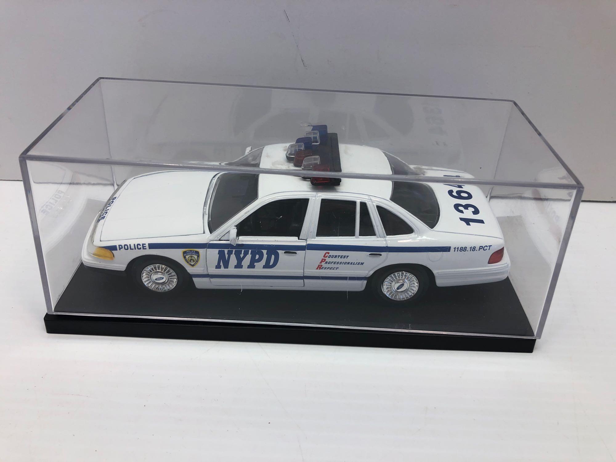 Die cast model NYPD Police car/display case | Proxibid
