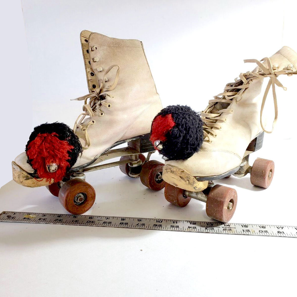 Skates With Pom Poms