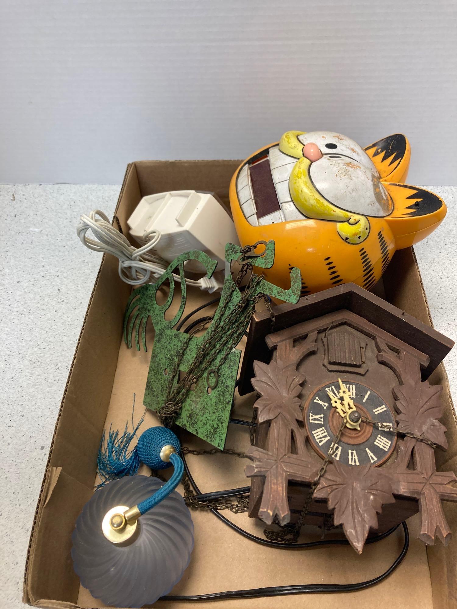 Cuckoo clock Garfield radio clock radio perfume | Proxibid