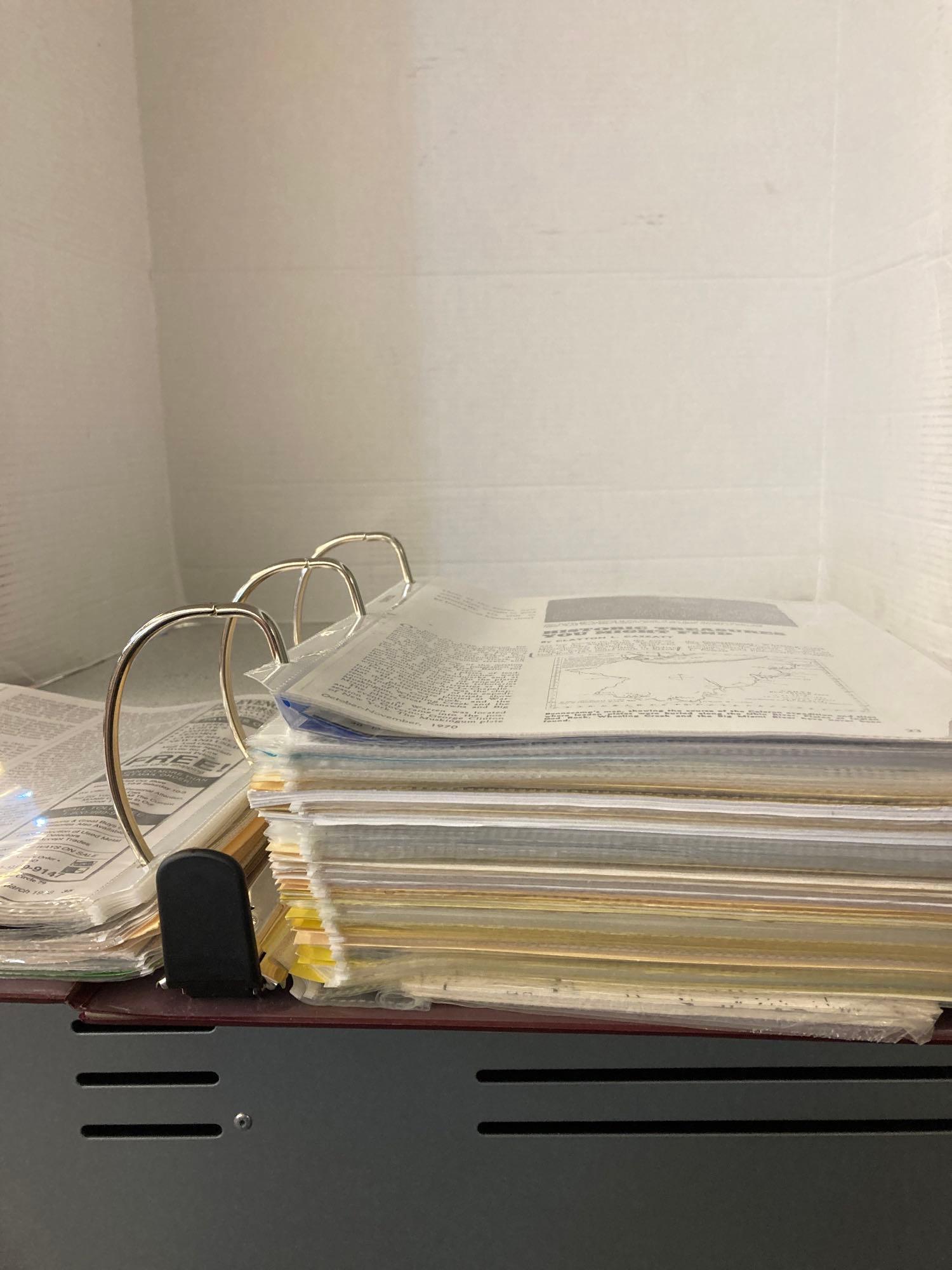 three ring binder filled with treasure hunting | Proxibid