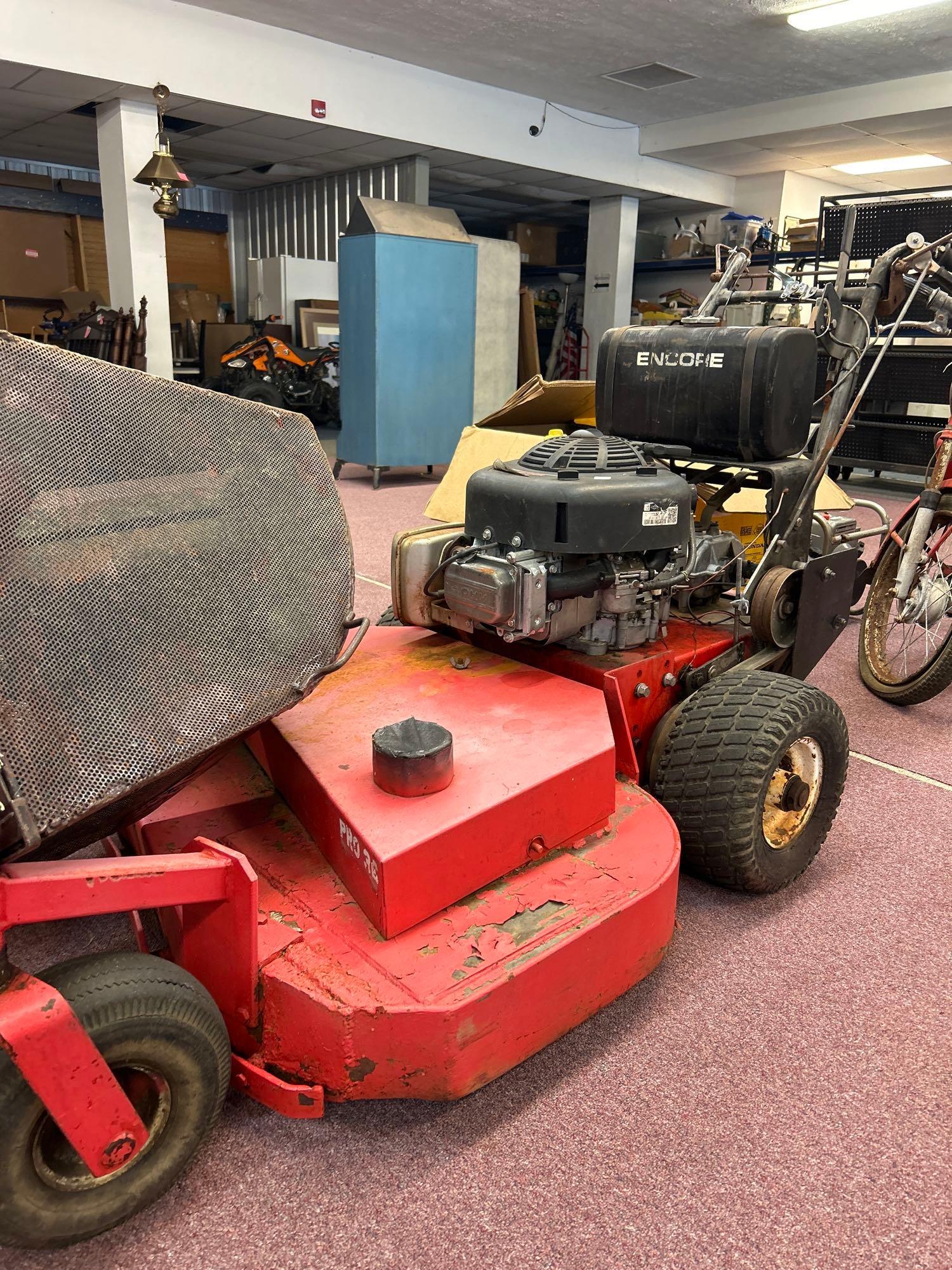 10 HP walk behind mower w/ bag attachment Good | Proxibid