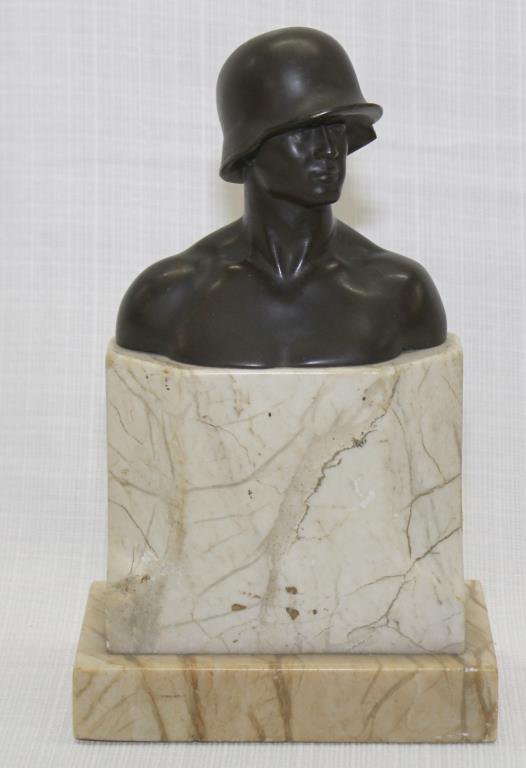 WW2 German soldier bust in 1935 German helmet | Proxibid