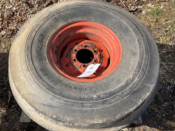 Pair 11:00-16 3 rib mounted tires on 6 bolt rims | Proxibid