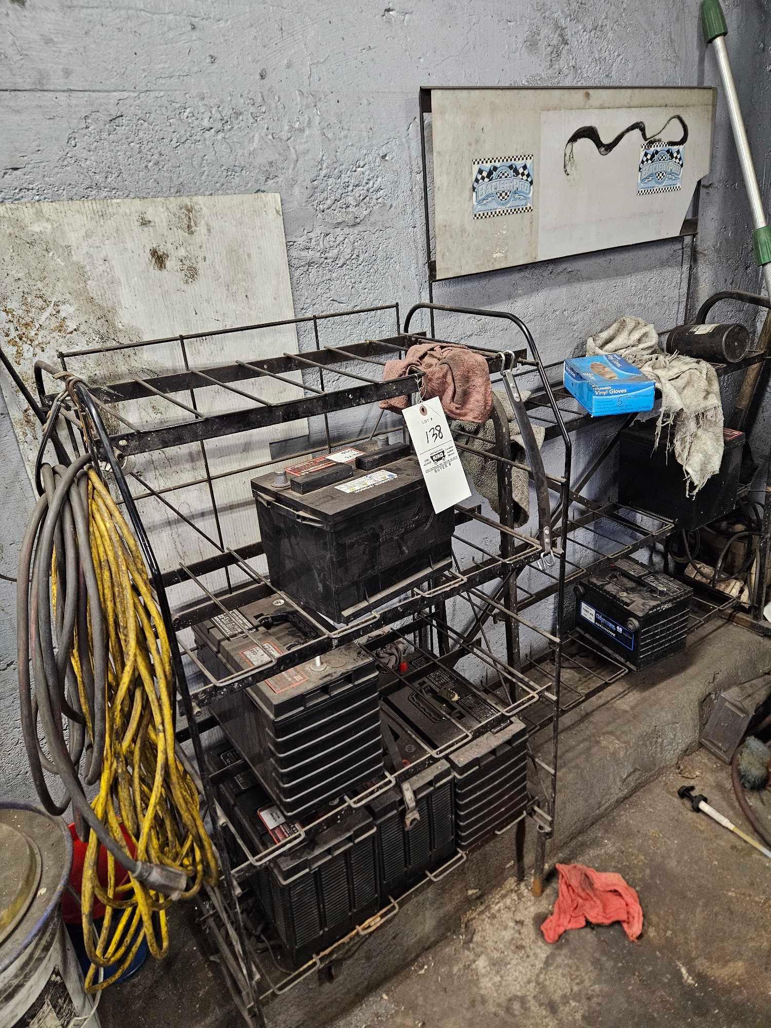 2 battery racks, used batteries | Proxibid