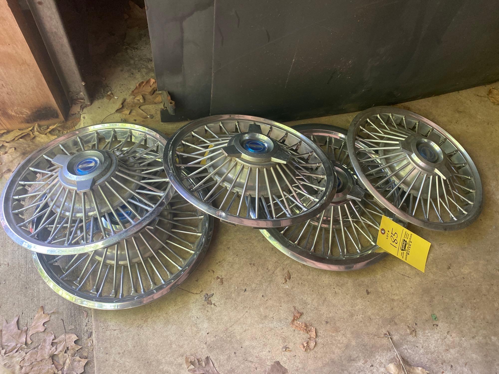 Ford Wire spoke blue center hub caps | Proxibid