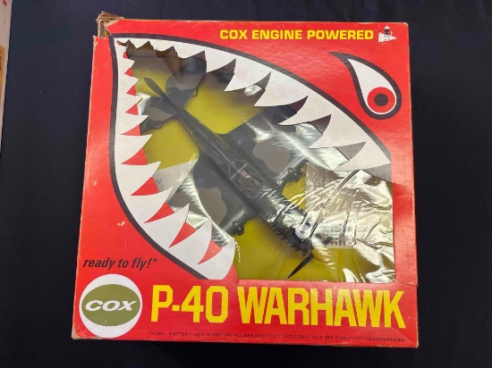Cox P-40 Warhawk gas powered plane | Online Auctions | Proxibid